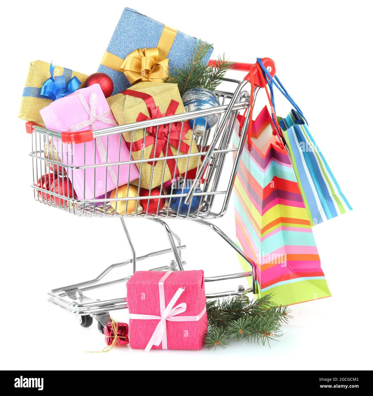 Christmas gifts in shopping trolley, isolated on white Stock Photo - Alamy