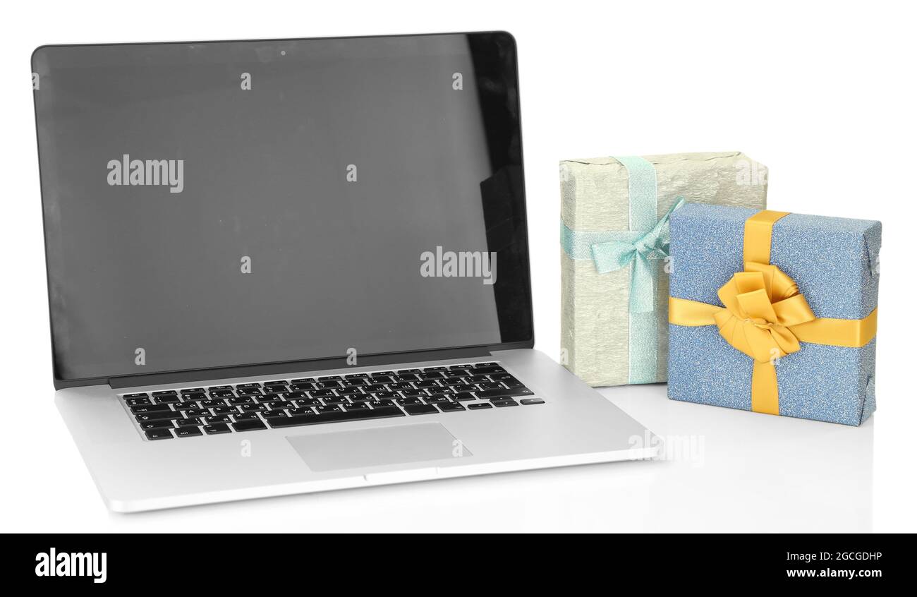 Modern notebook and gift boxes, isolated on white Stock Photo - Alamy