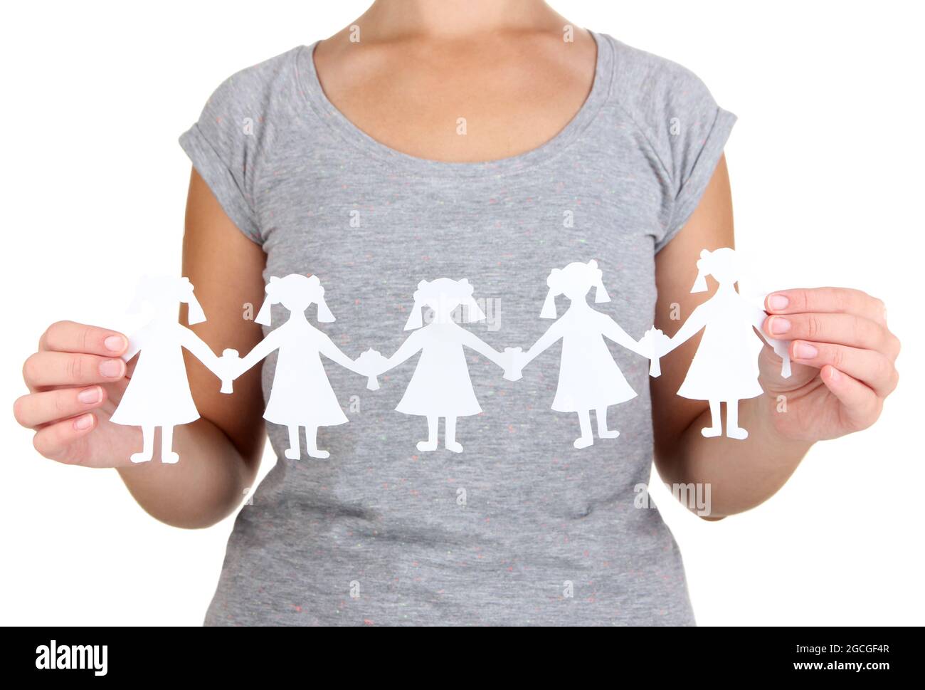 Paper people in hands isolated on white Stock Photo - Alamy