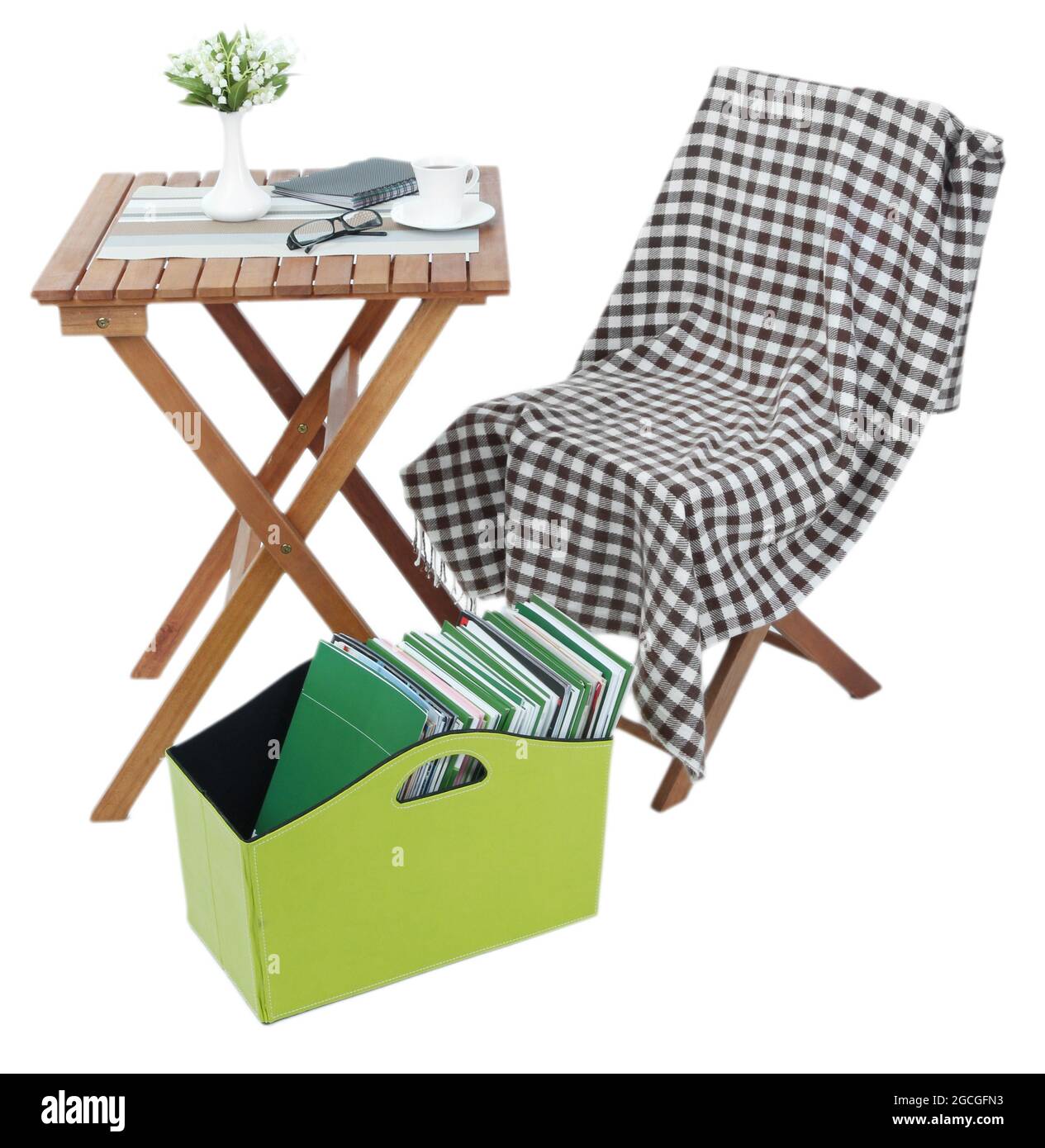 Magazines and folders in green box isolated on white Stock Photo - Alamy