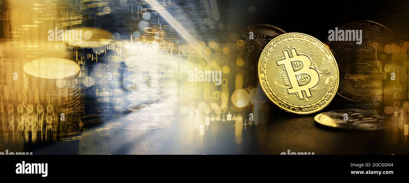 glowing golden bit coin model with coin money stack and stock market ...