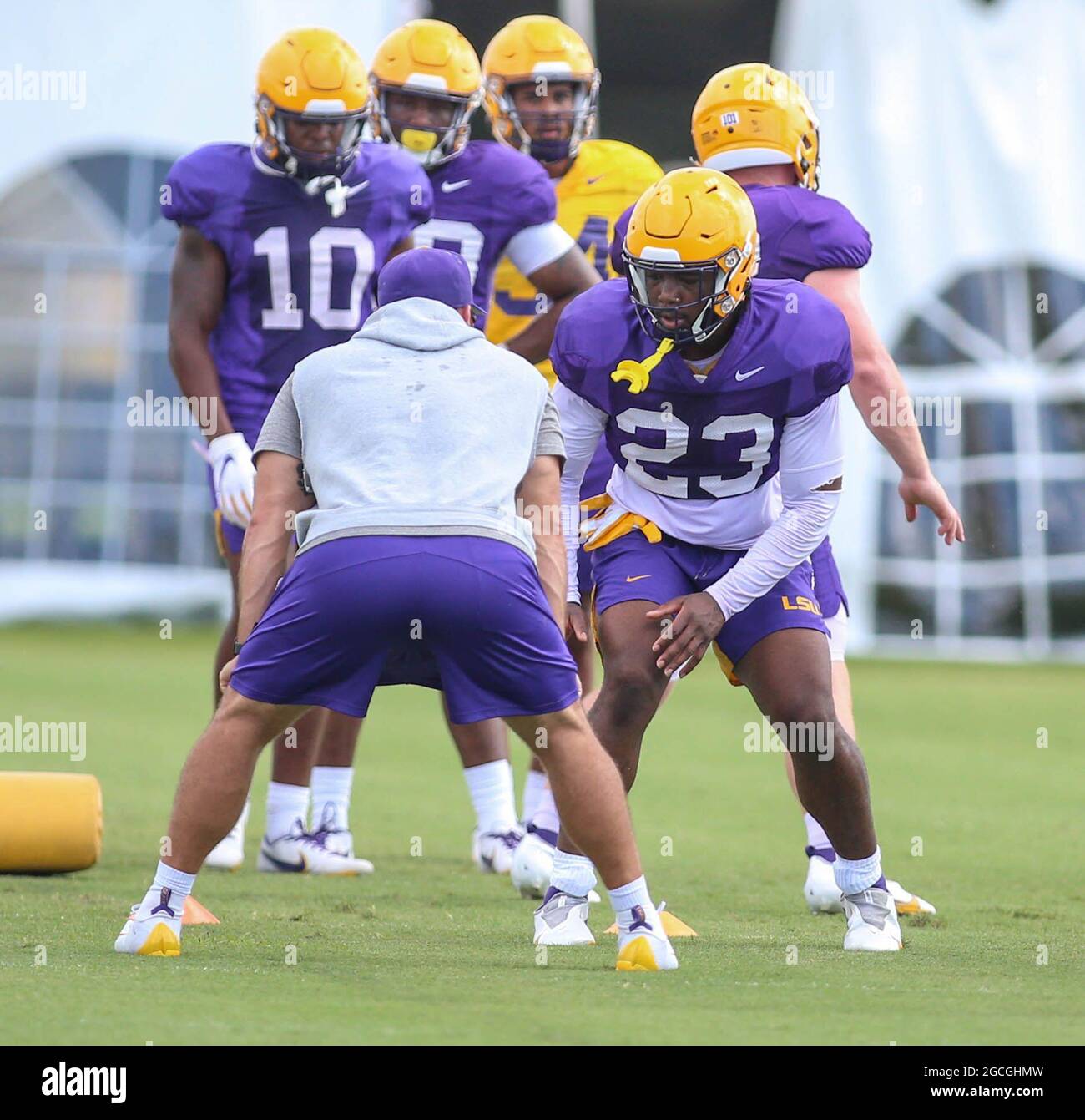 August 8, 2021: LSU linebacker Micah Baskerville (23) runs a drill with ...