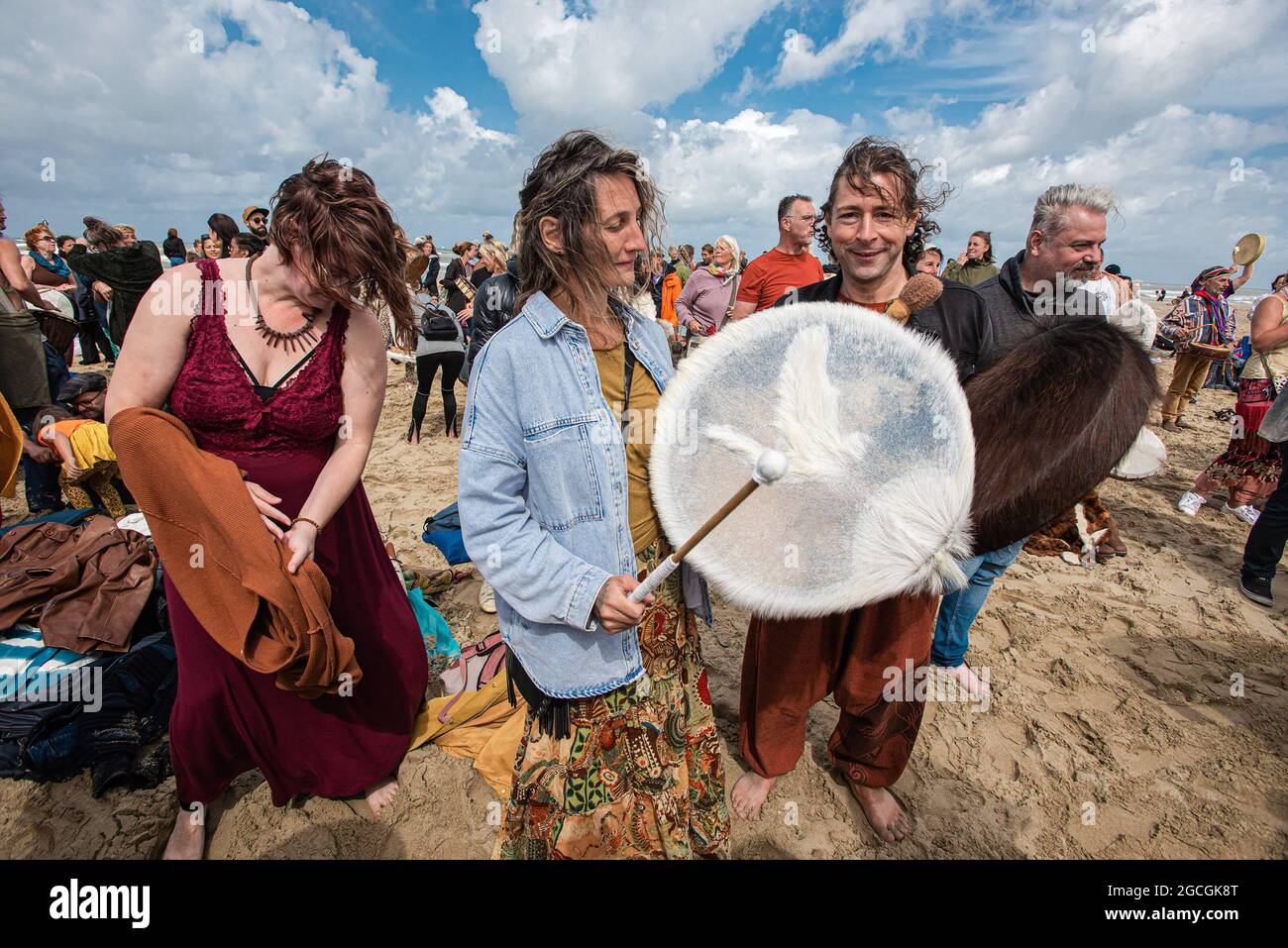 A woman playing a drum during the 'Gathering of Drums'.Hundreds of 'New ...