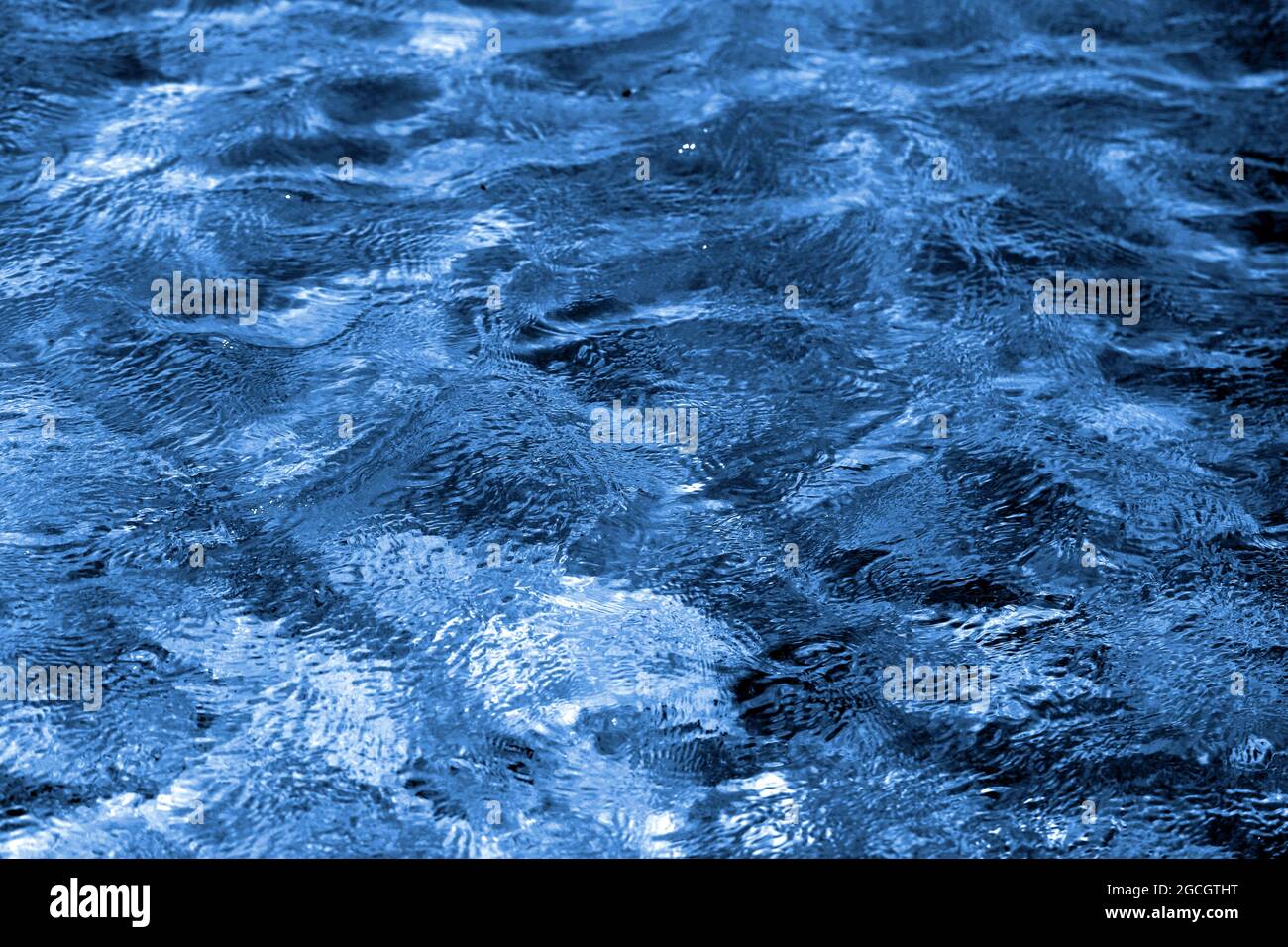 Blue bright transparent background of pool water, an example for a ...