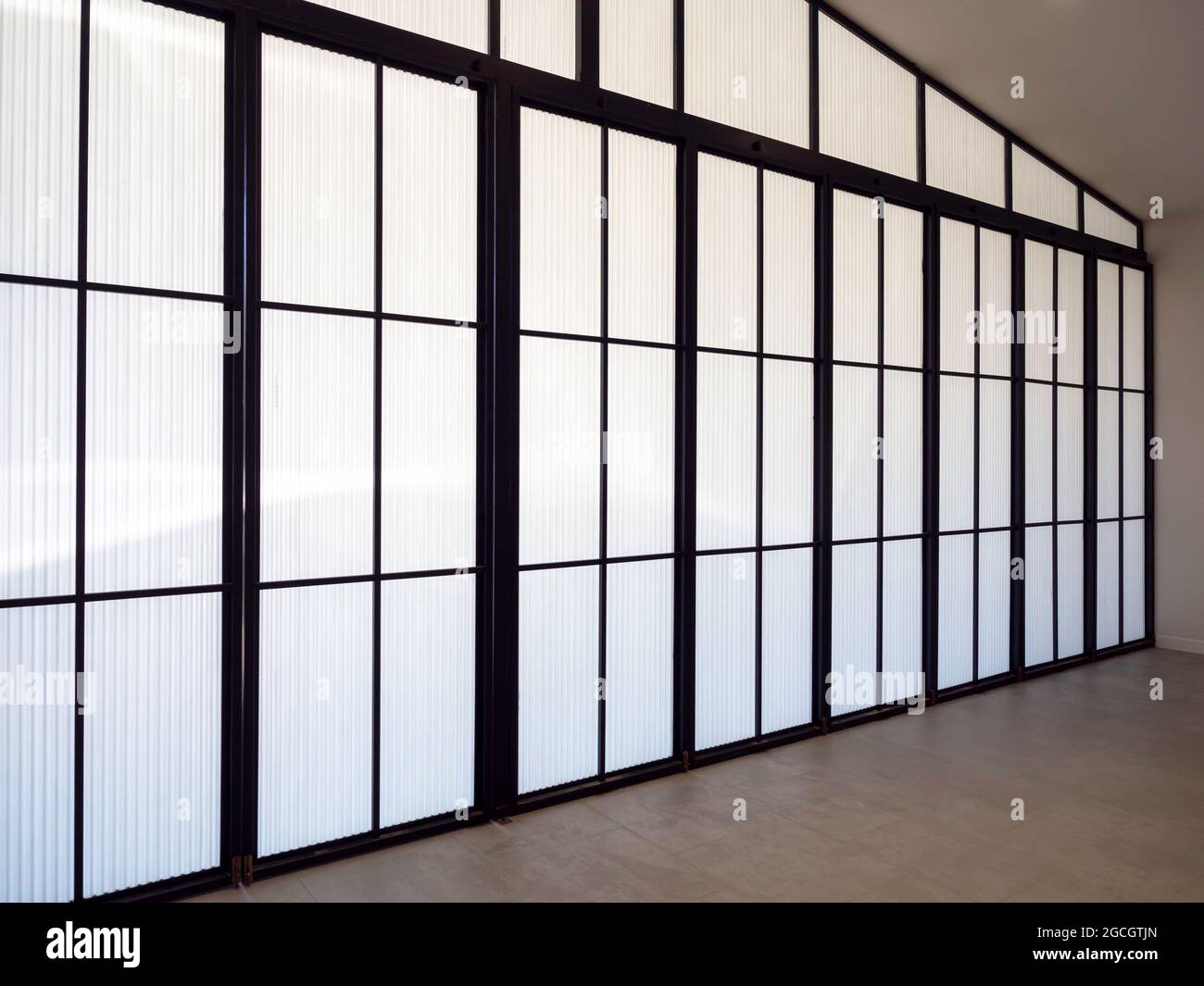 Warehouse door with large white translucent door construction, inside ...