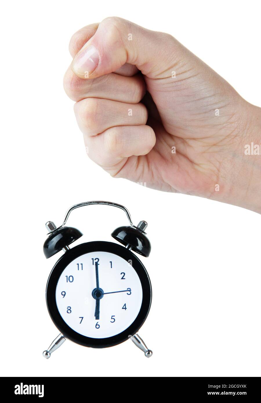 Alarm clock and hand isolated on white Stock Photo - Alamy