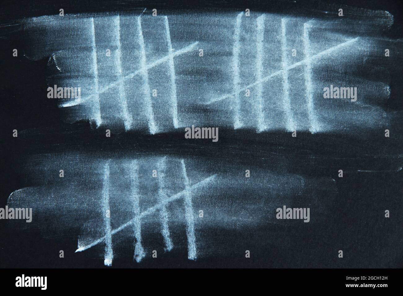 Counting days by drawing sticks isolated on black Stock Photo - Alamy