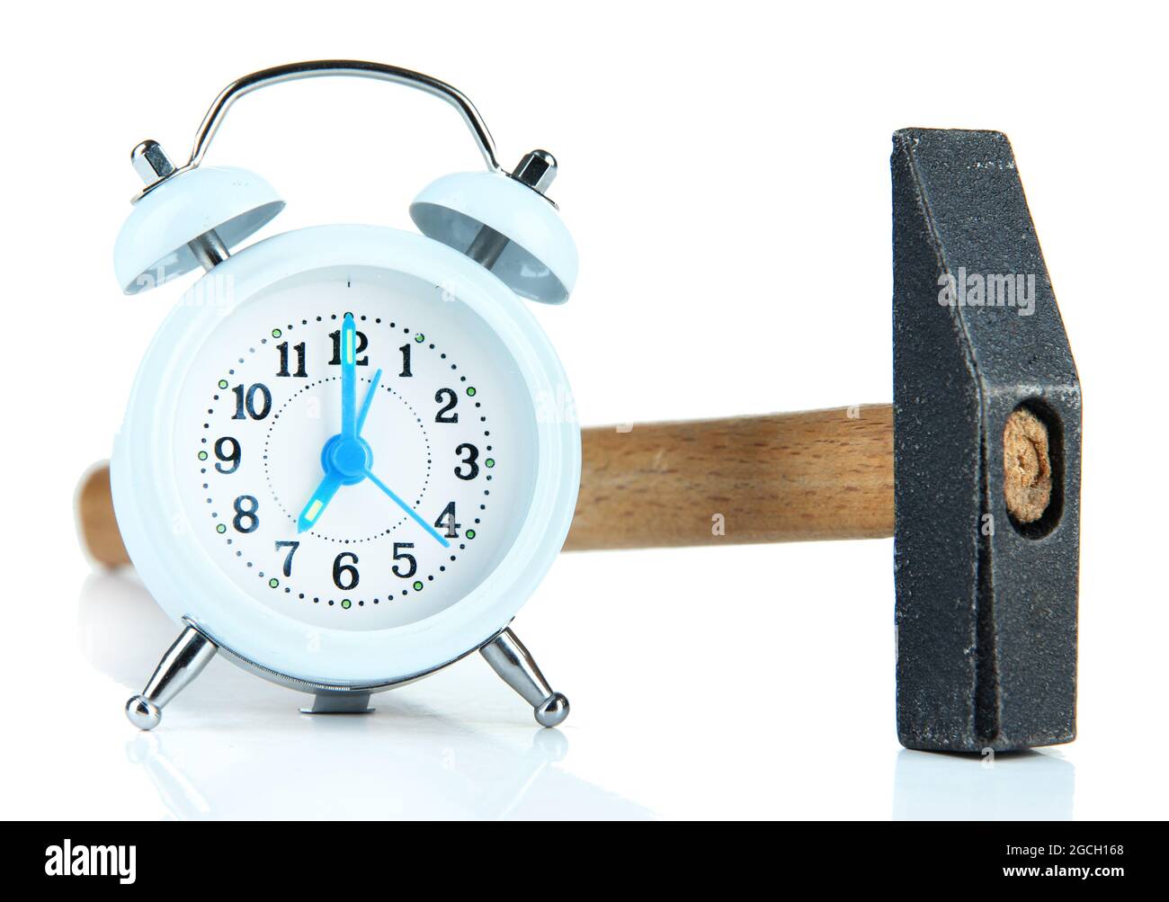 Hammer and alarm clock isolated on white Stock Photo - Alamy