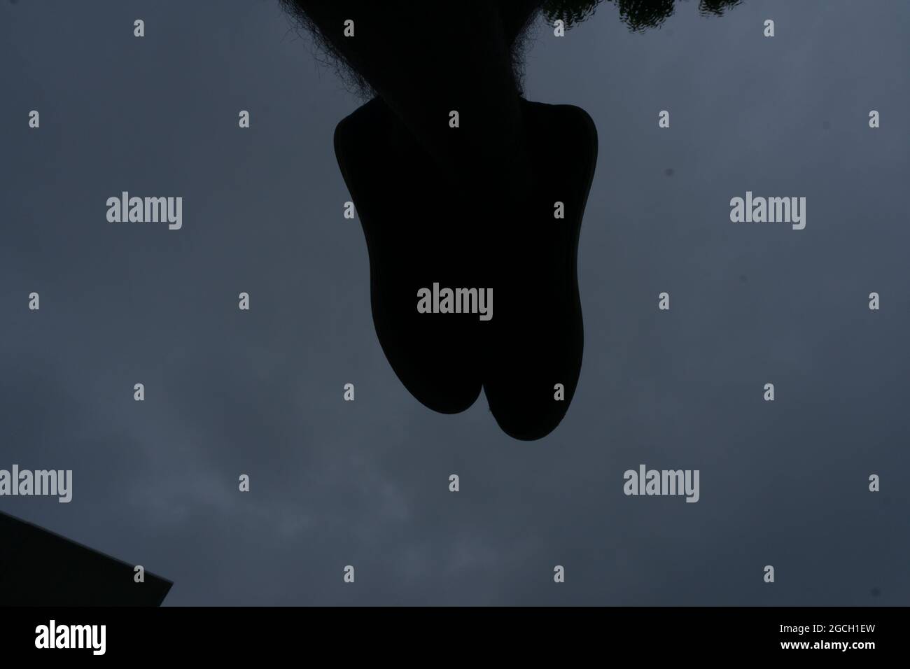 clicking legs lifting upside sky Stock Photo - Alamy