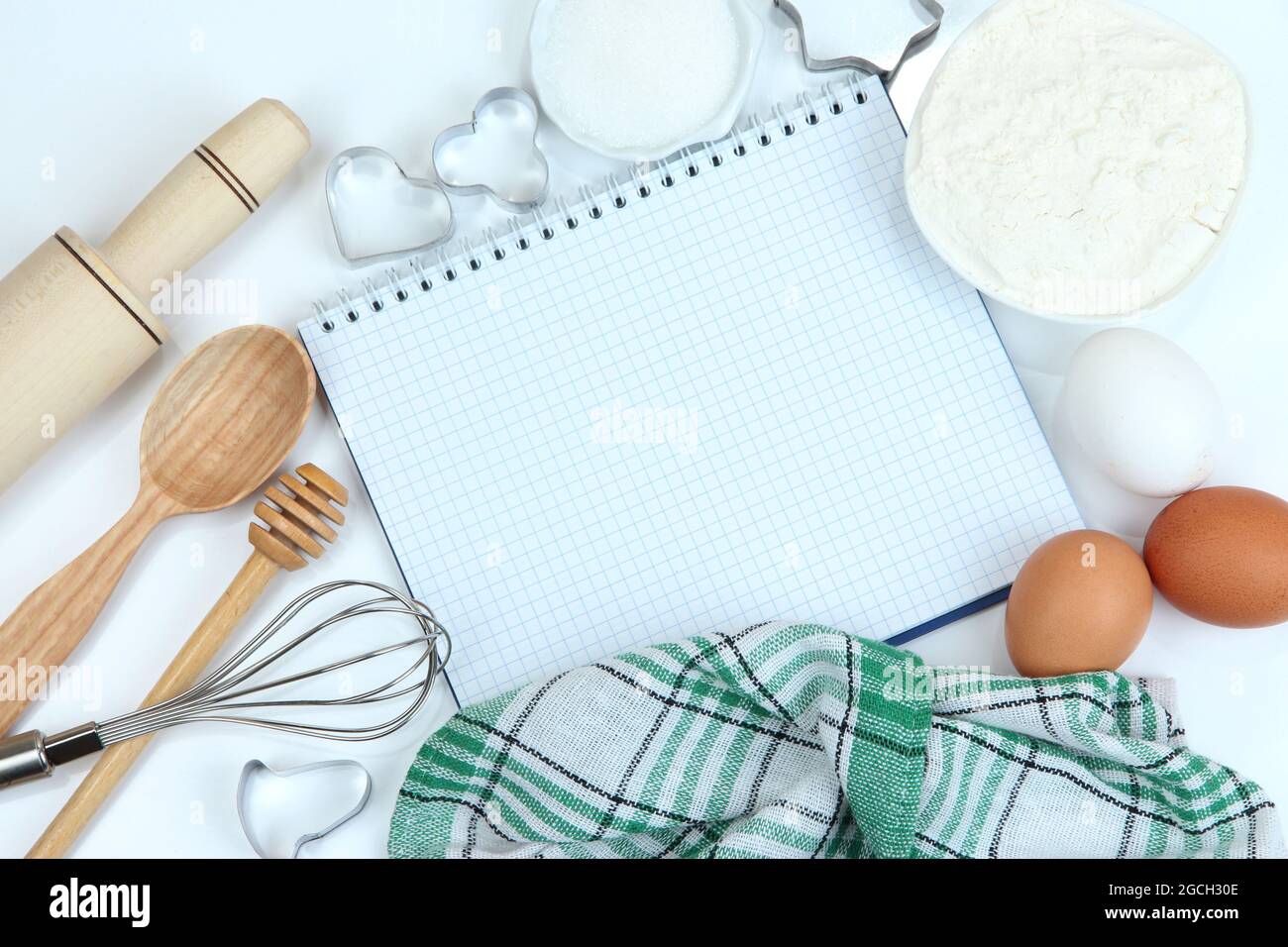 Cooking concept. Basic baking ingredients and kitchen tools close up ...