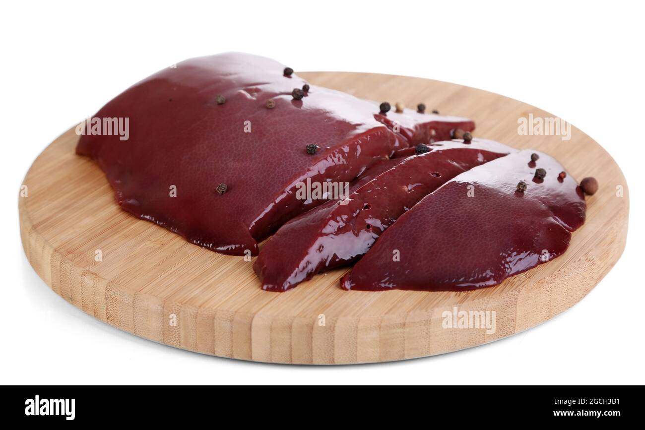 Raw liver on wooden board isolated on white Stock Photo - Alamy