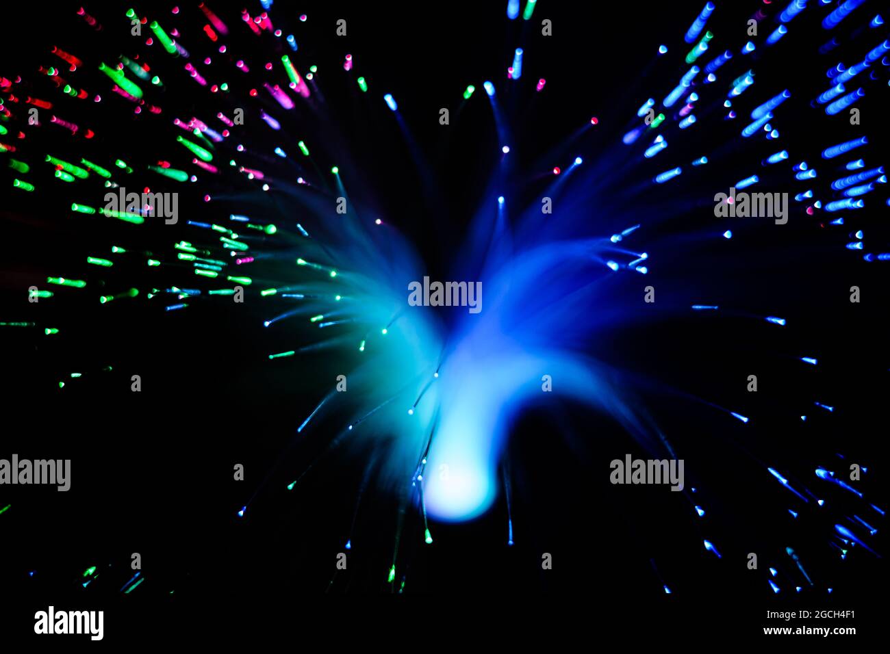 Optical fiber network cable on black background Stock Photo - Alamy