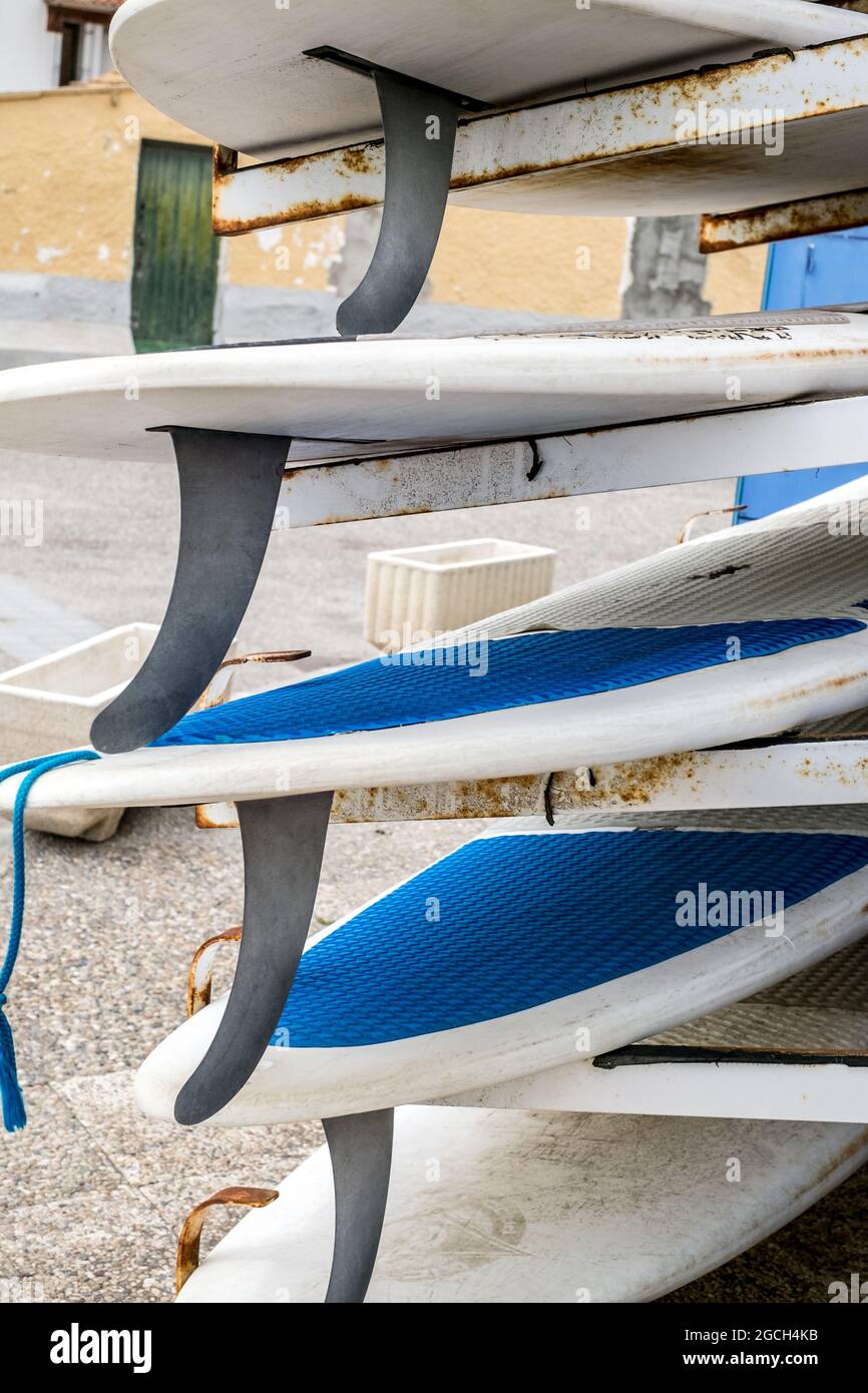 surfboards stacked in a rack Stock Photo - Alamy