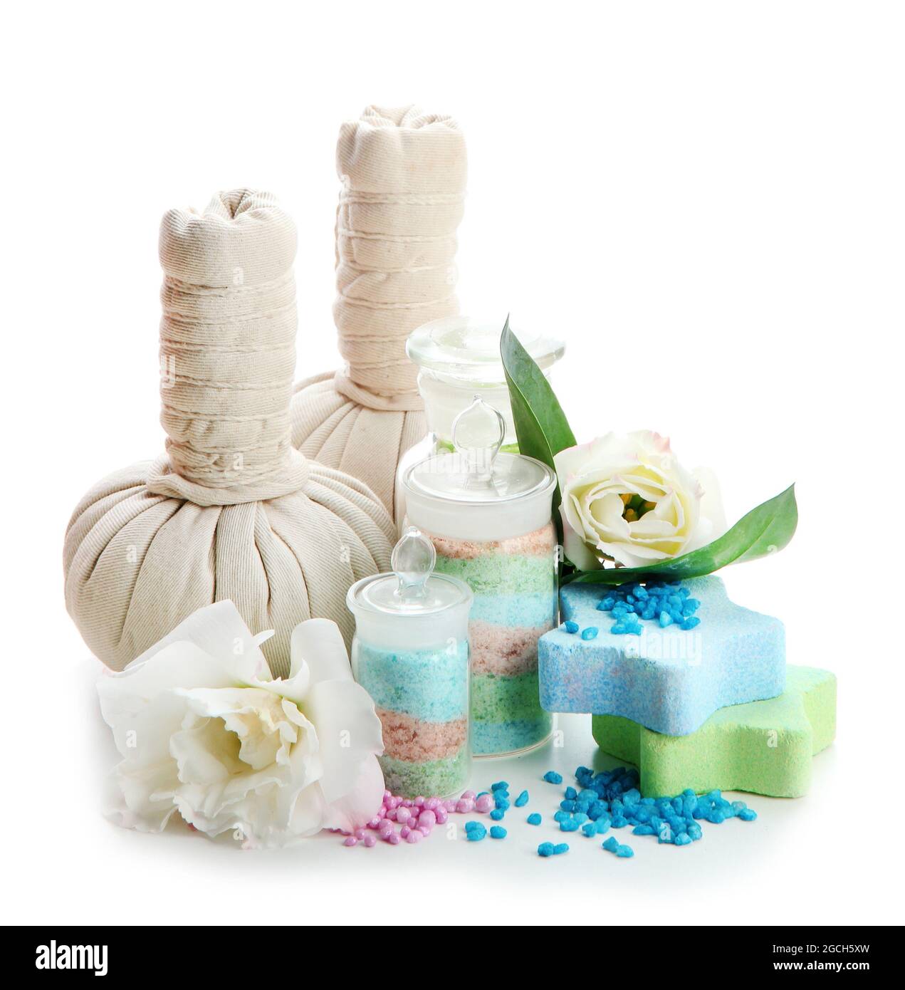 Aromatic salts in glass bottles and herbal compress balls for spa ...