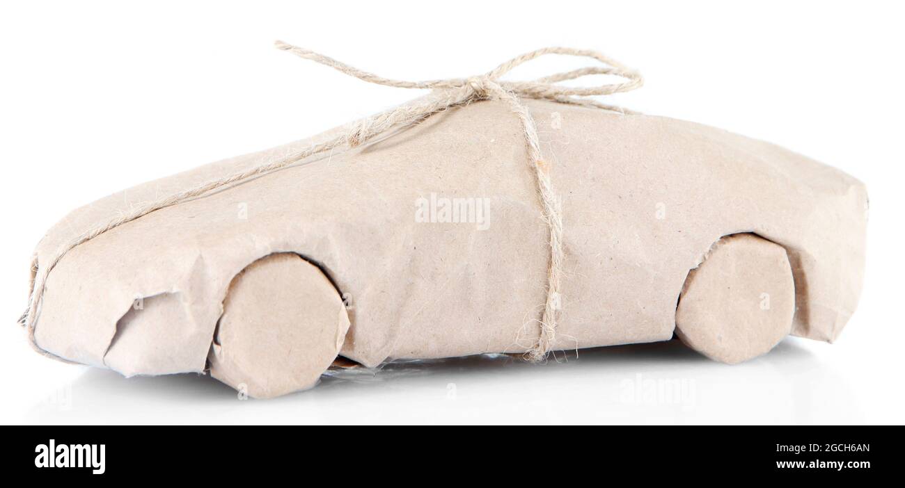 Car wrapped in brown kraft paper, isolated on white Stock Photo - Alamy