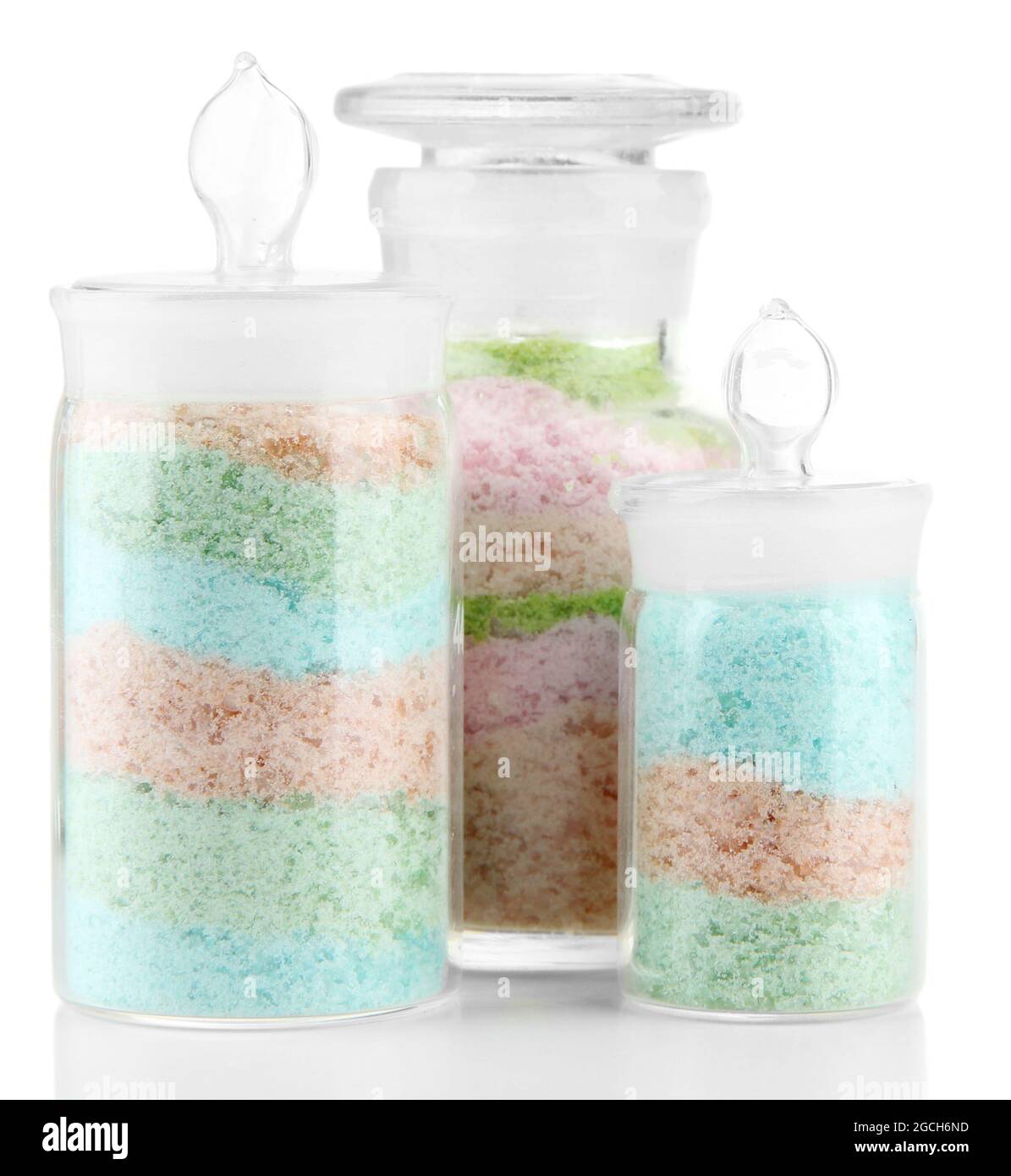 Aromatic salts in glass bottles, isolated on white Stock Photo - Alamy