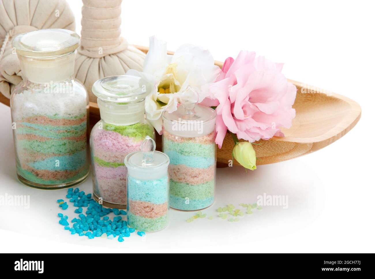 Aromatic salts in glass bottles and herbal compress balls for spa ...