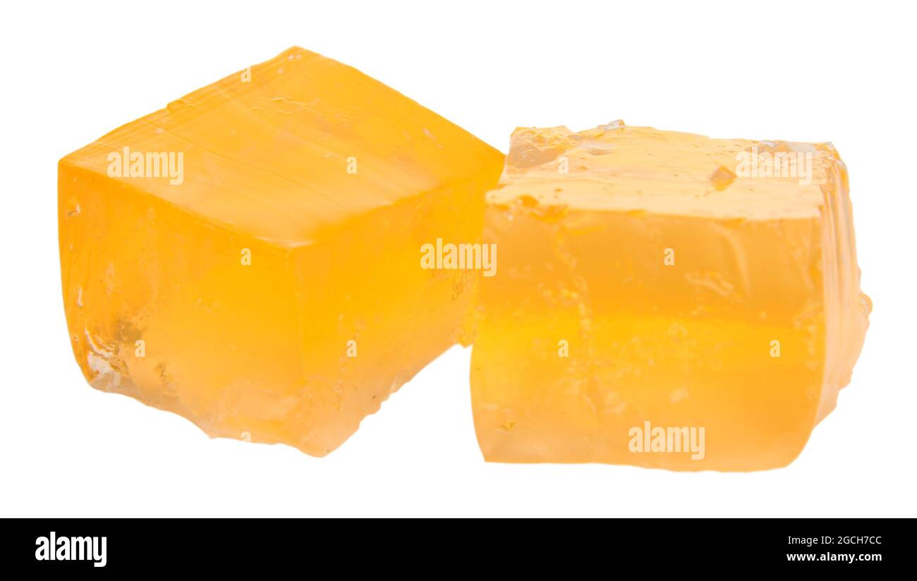 Tasty jelly cubes isolated on white Stock Photo - Alamy