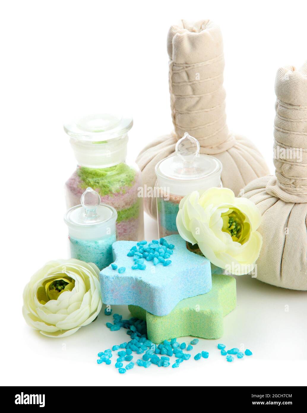 Aromatic salts in glass bottles and herbal compress balls for spa ...