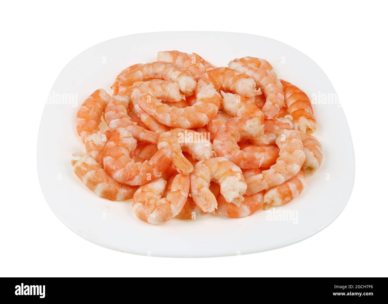 Peeled boiled shrimp meat on ceramic plate. Isolated on white macro ...