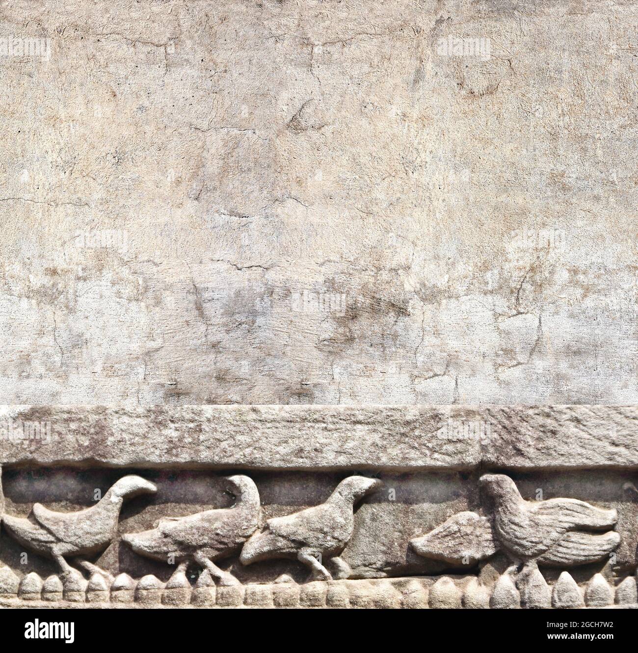 Retro background with ancient wall carving with birds. Vertical banner ...