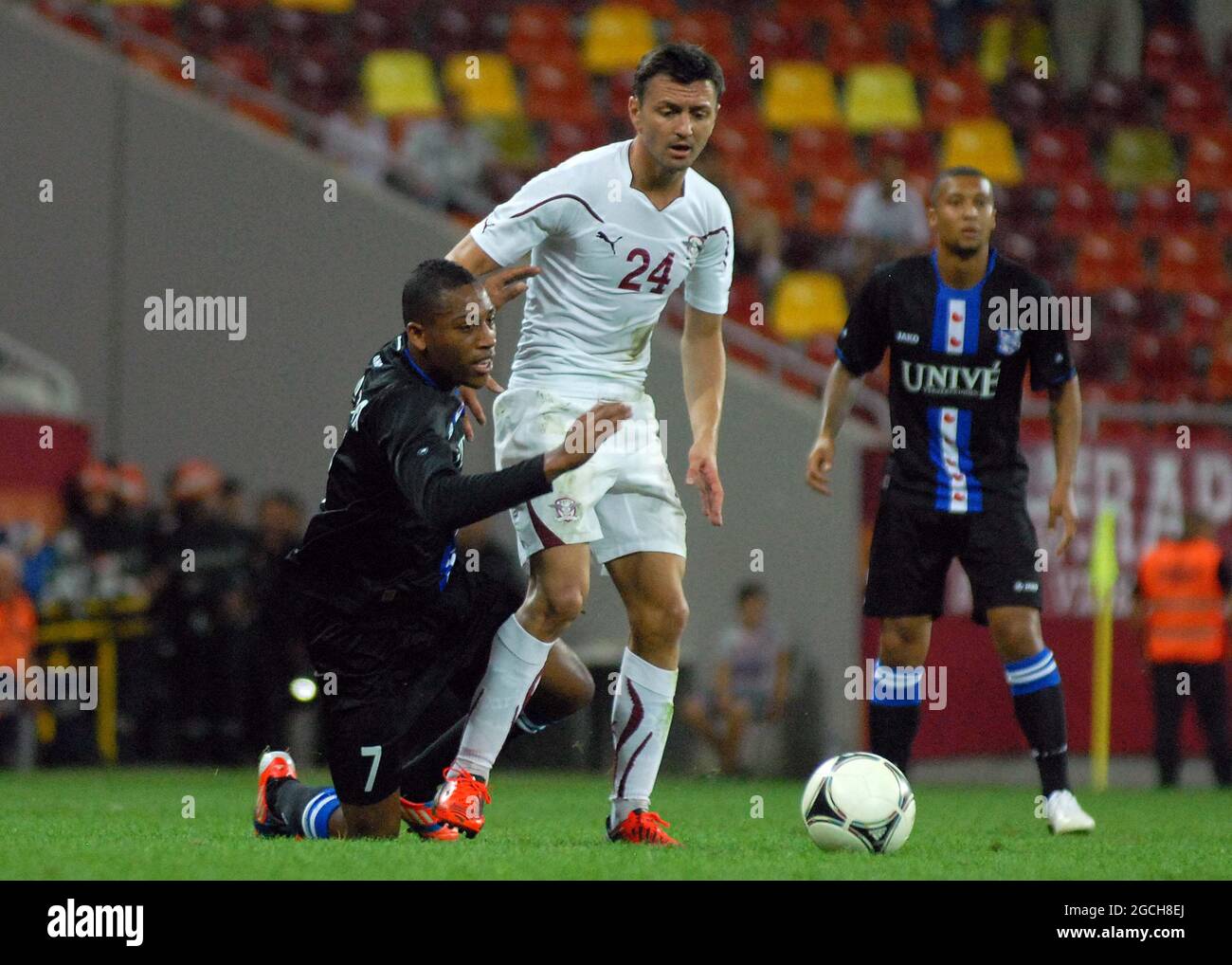 BUCHAREST, ROMANIA - AUGUST 9, 2012: Romeo Surdu (R) of Rapid pictured ...