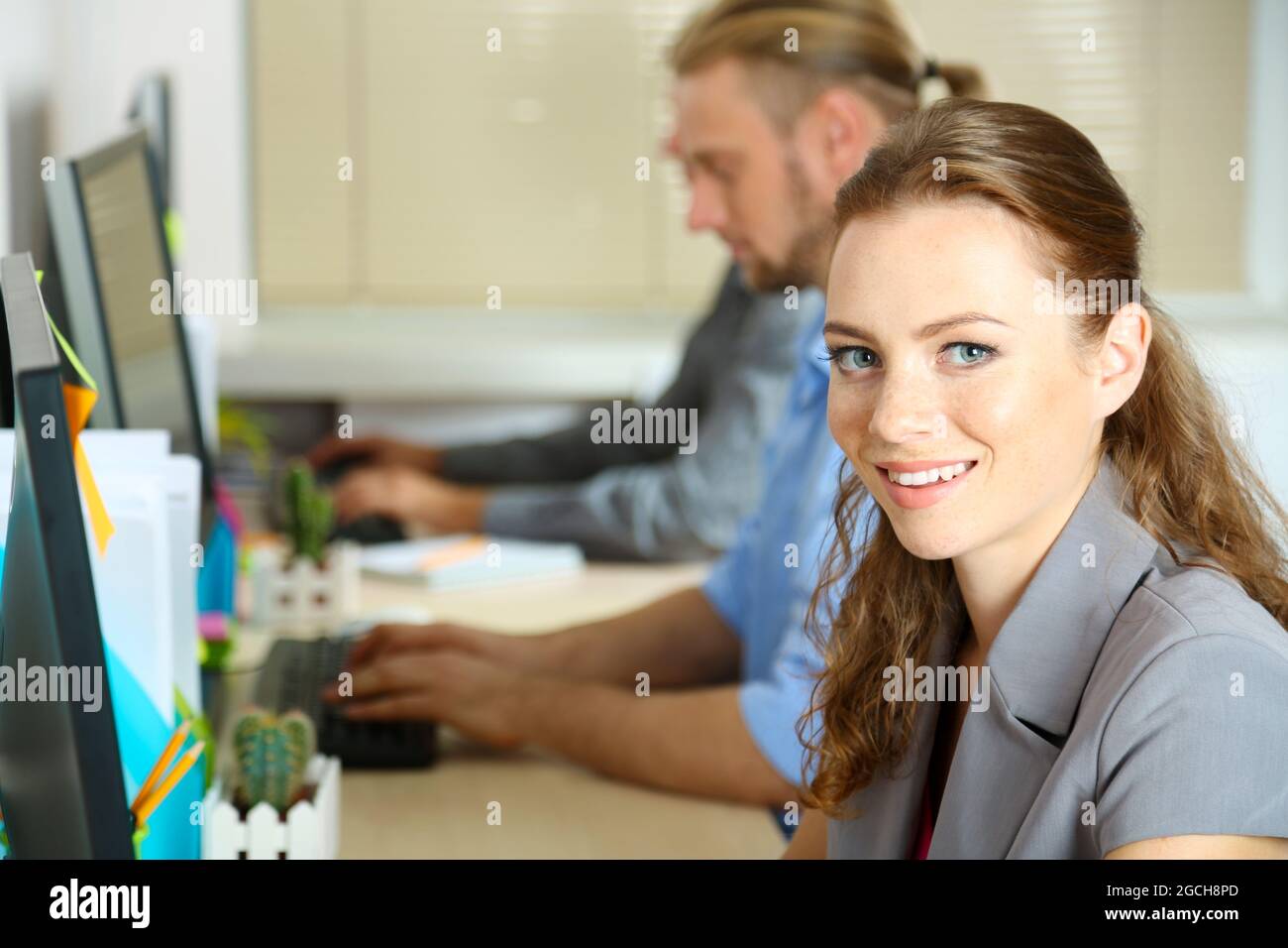 Business people at work place Stock Photo - Alamy