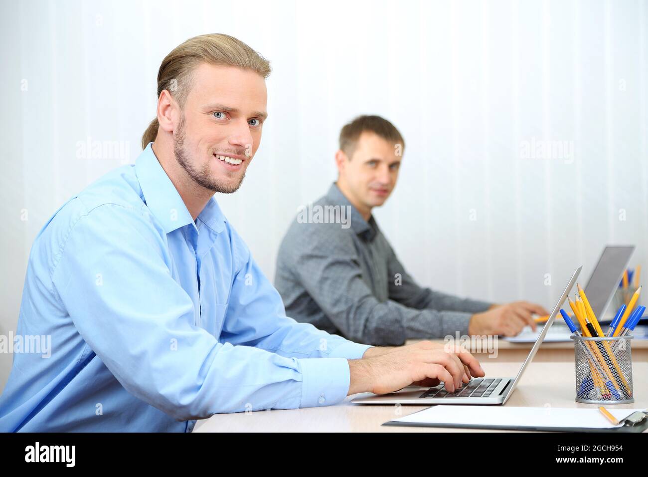 Office staff is during work in workplace Stock Photo - Alamy