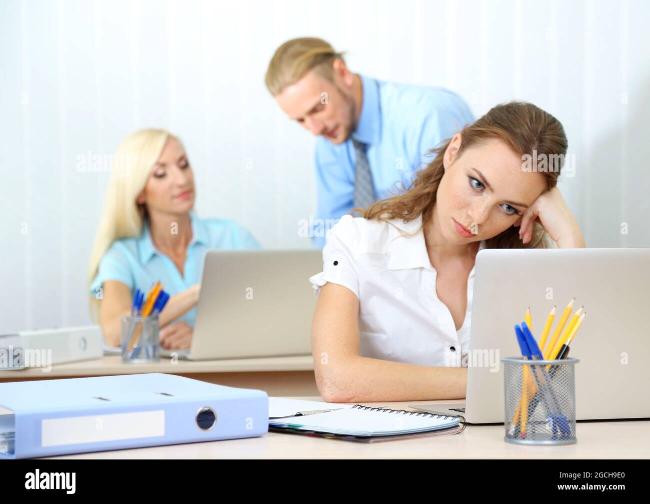 Office staff is during work in workplace Stock Photo - Alamy