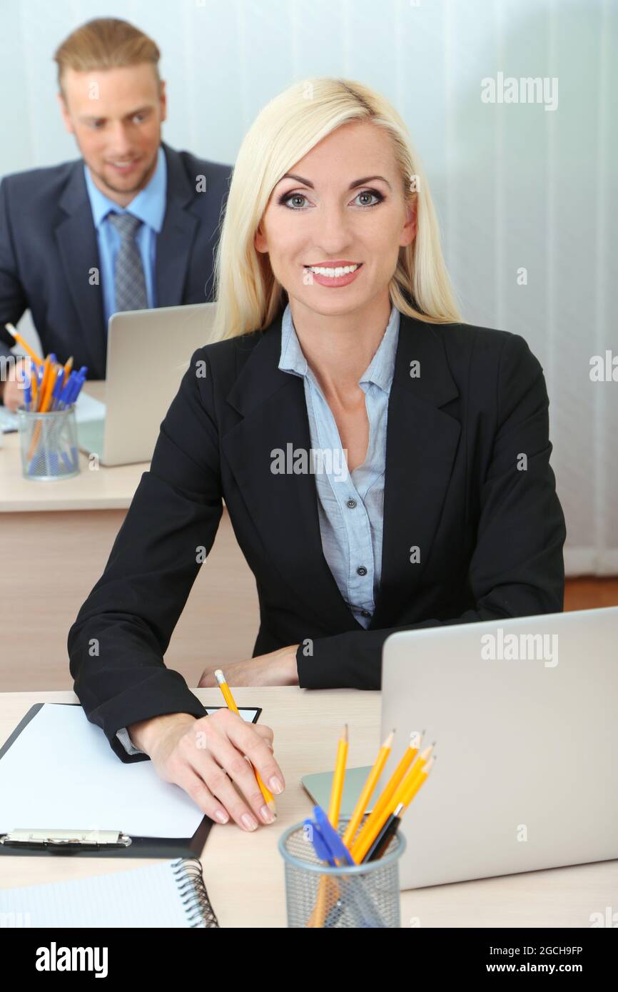 Office workers in workplace Stock Photo - Alamy