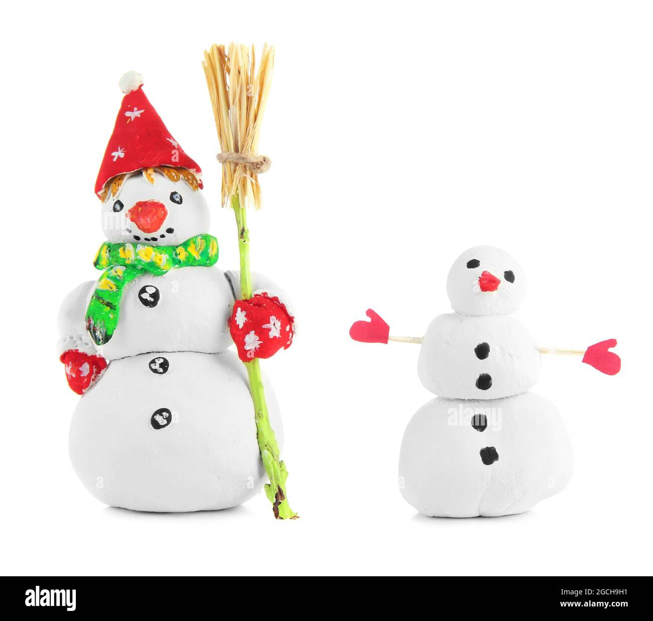 Beautiful snowmen isolated on white Stock Photo - Alamy