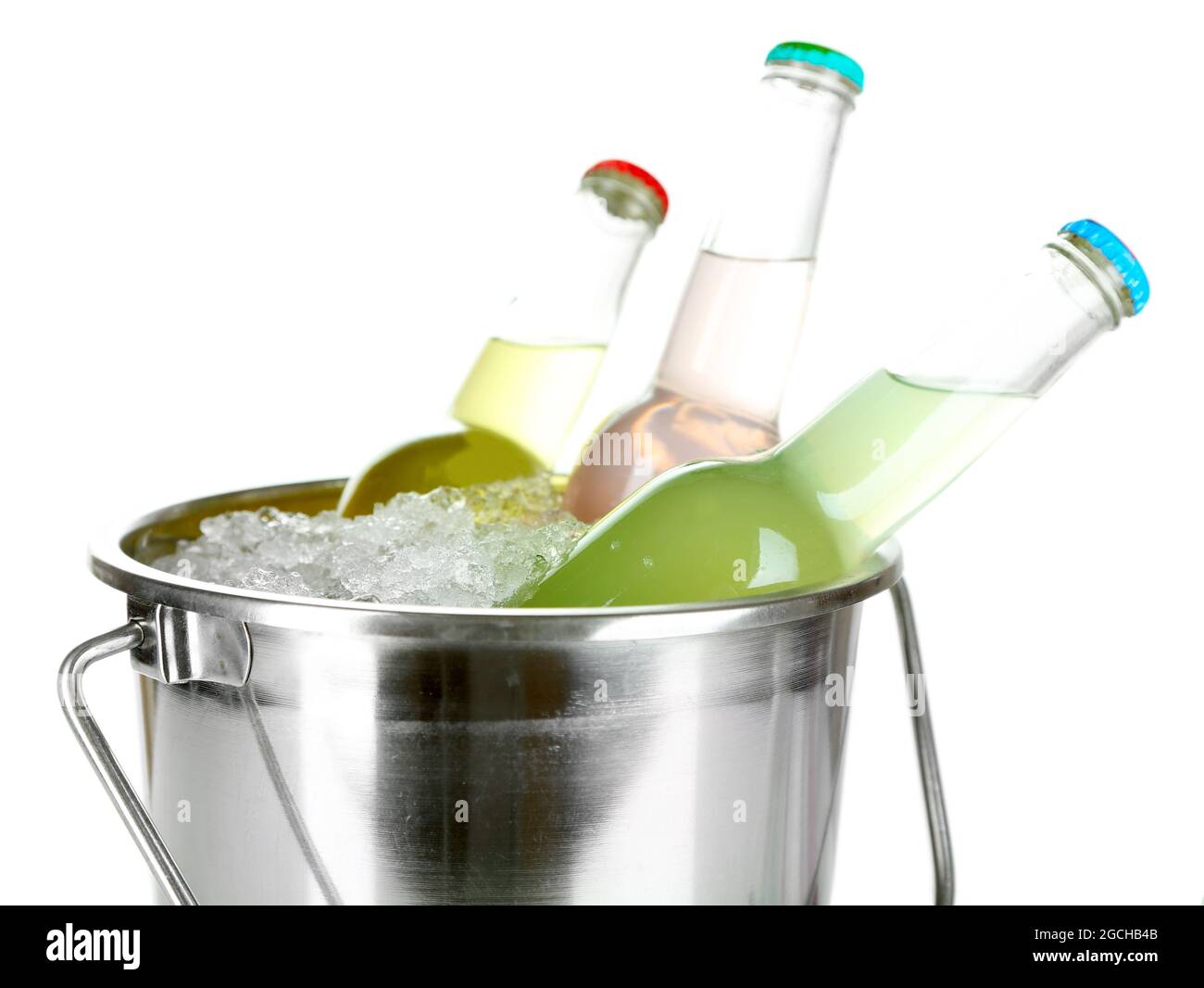 Bottled drinks in ice bucket isolated on white Stock Photo - Alamy