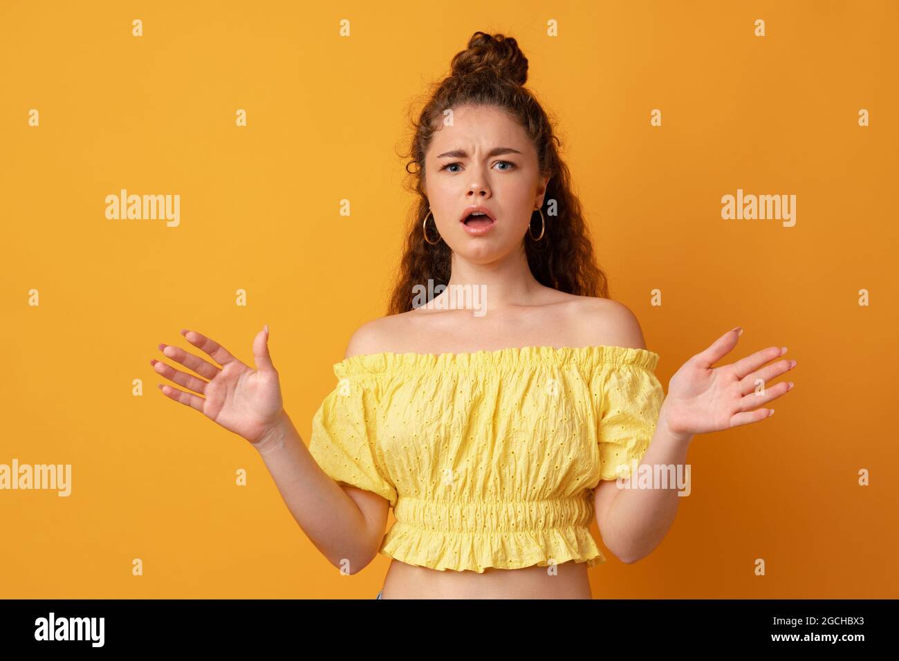 Shocked and surprised girl screaming against pink background Stock ...