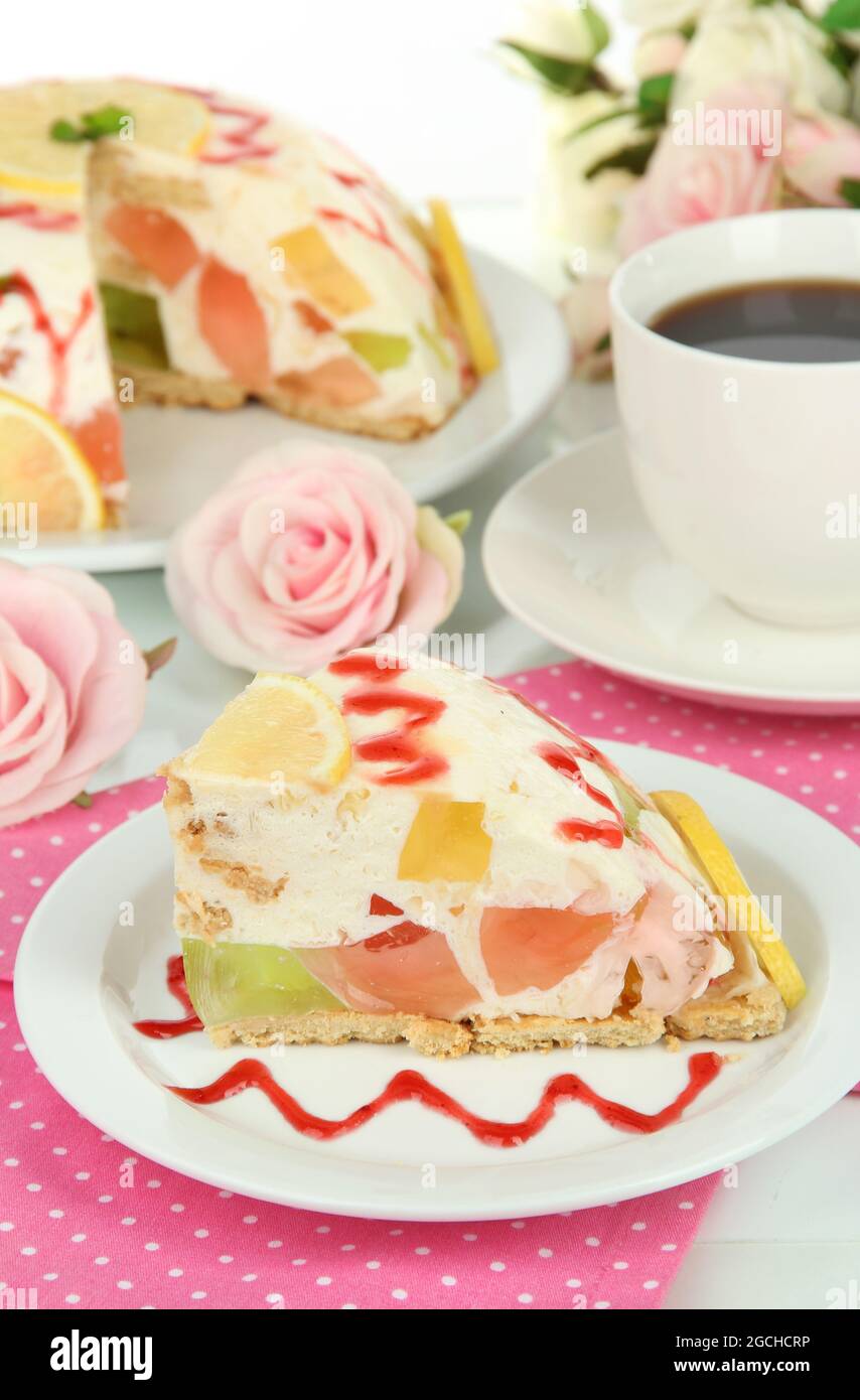 Delicious jelly cake on table on white background Stock Photo - Alamy