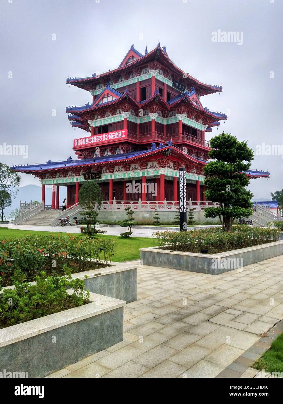 Beautiful pagoda castle palace with a small topiary tree garden in ...