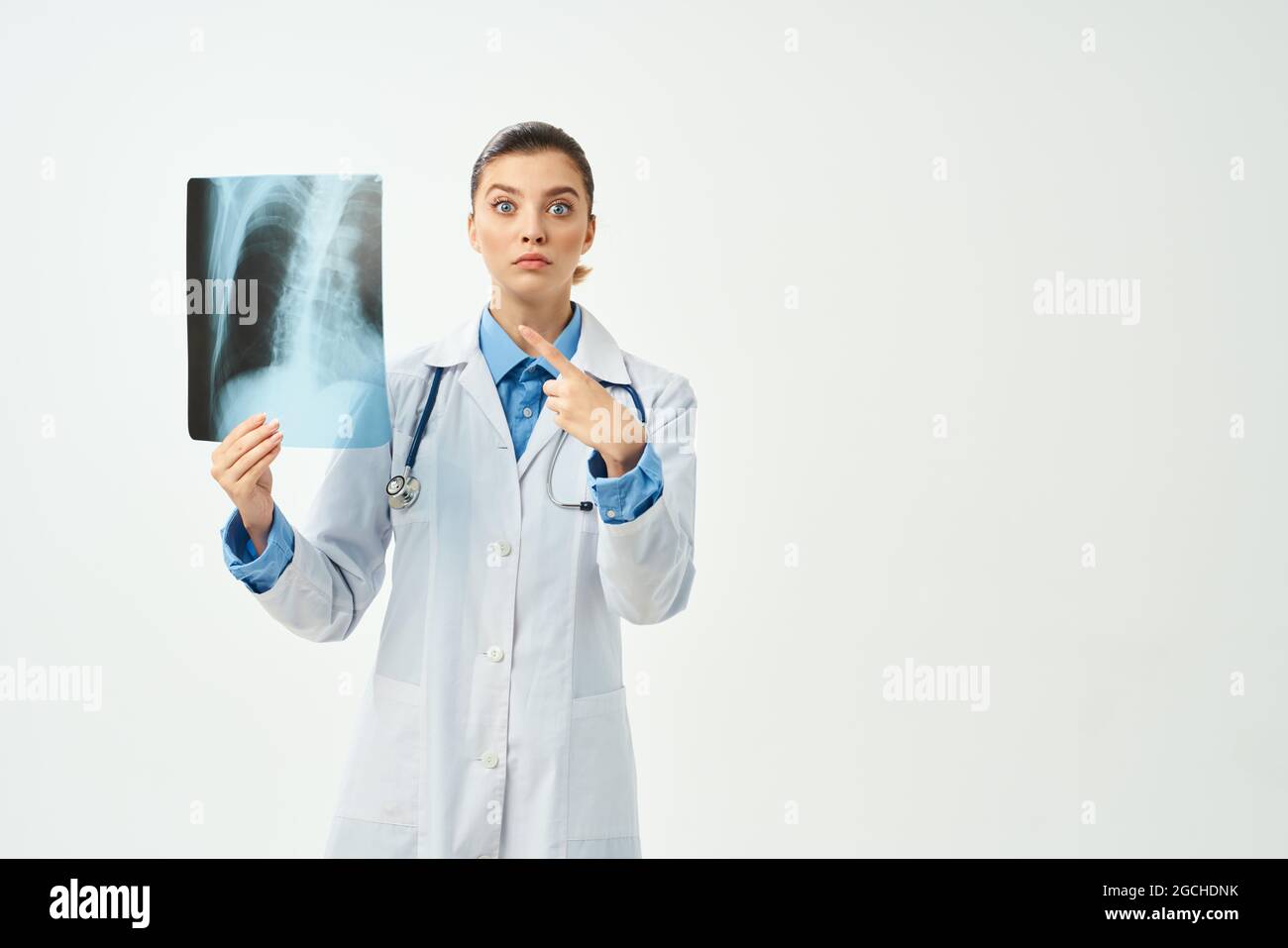 female doctor dressing gown x-ray emotion hospital Stock Photo - Alamy