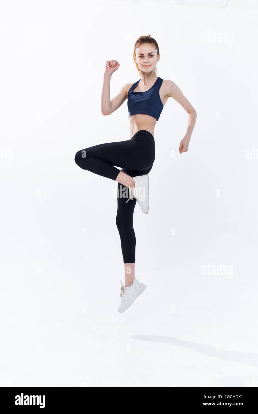 sportive woman jumping workout energy active lifestyle Stock Photo - Alamy