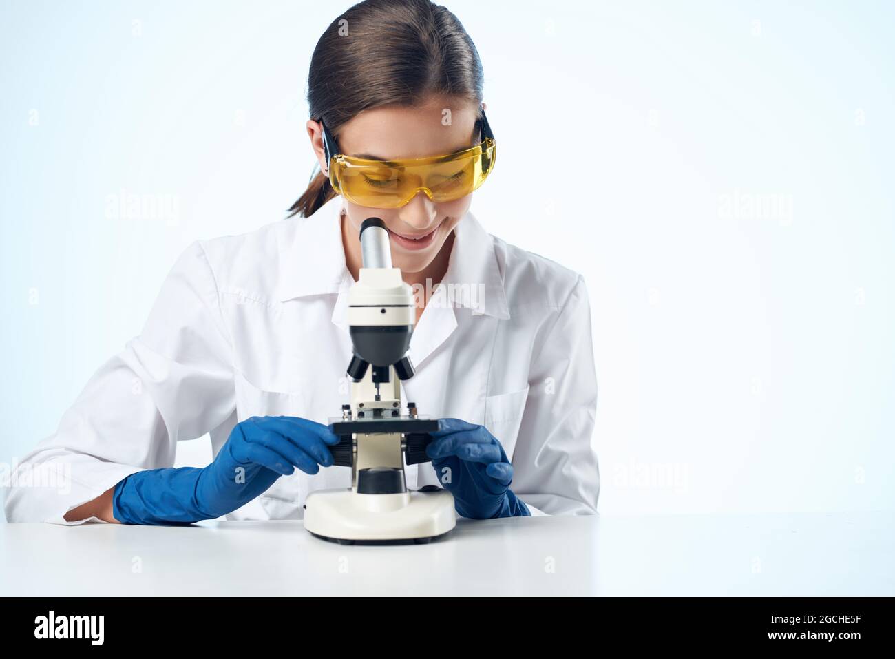 female doctor laboratory research microscope science Stock Photo - Alamy