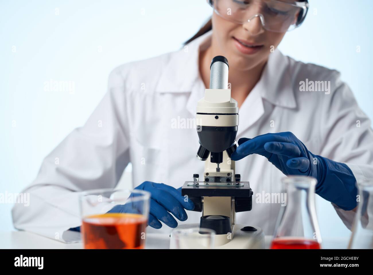 female laboratory assistant chemistry research microbiology Stock Photo ...