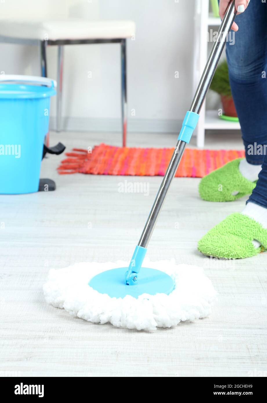 Mopping floor at home close-up Stock Photo - Alamy