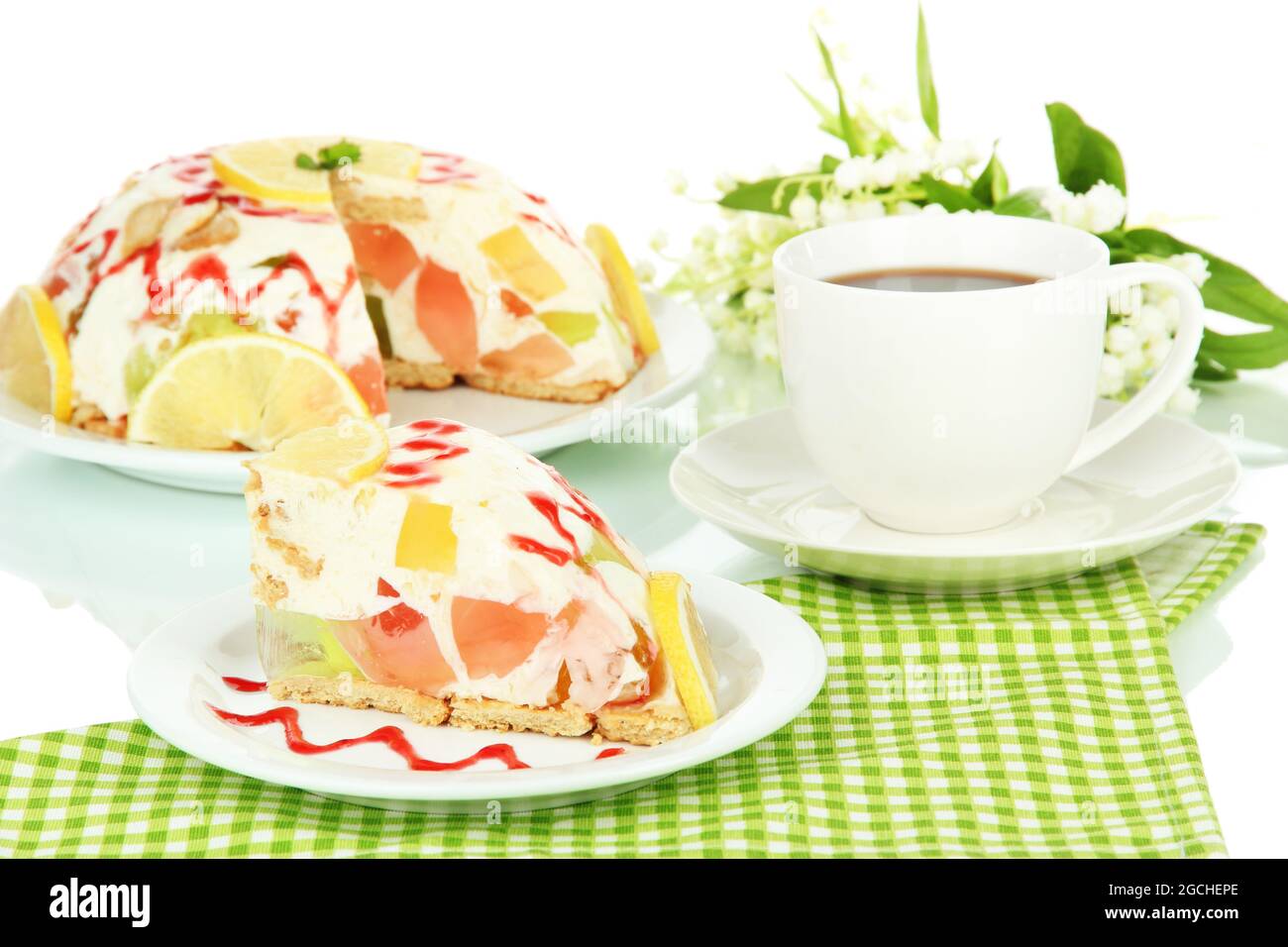 Delicious jelly cake on table on white background Stock Photo - Alamy