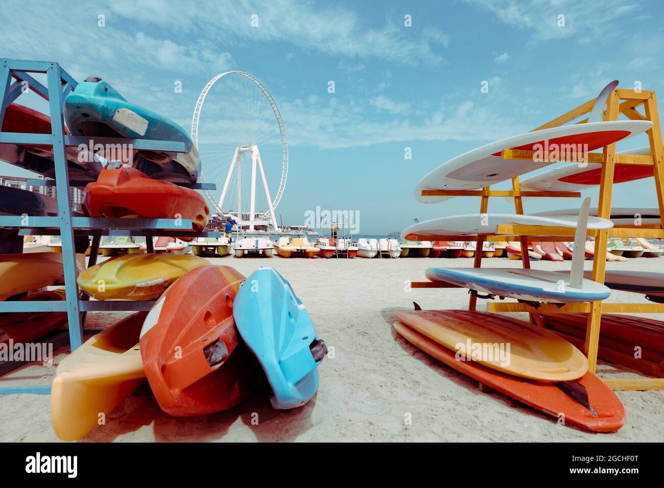 Surfboards stacked on the rack on a beach Stock Photo - Alamy