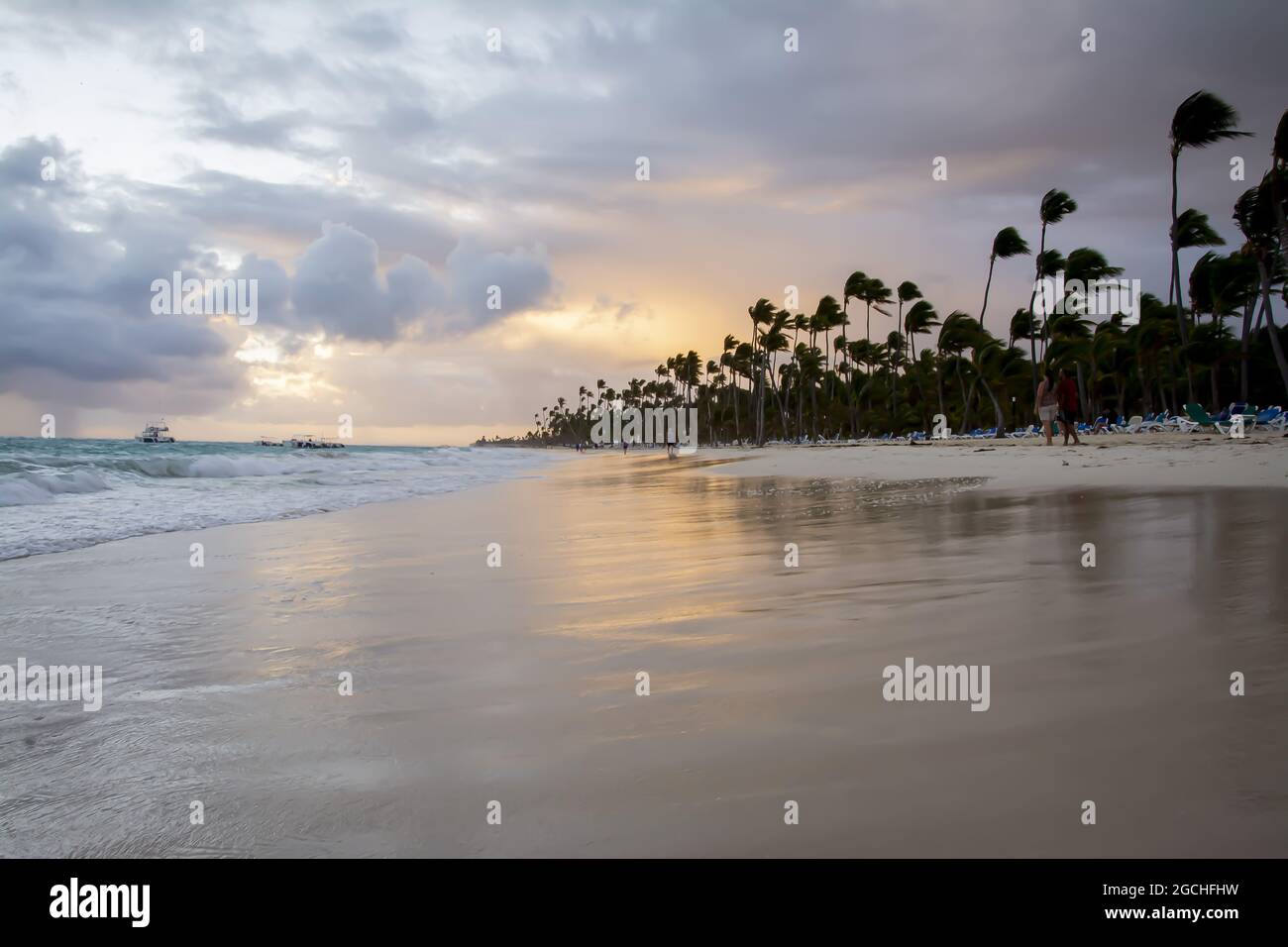 Stunning sunset scenery over the sandy beach Stock Photo - Alamy