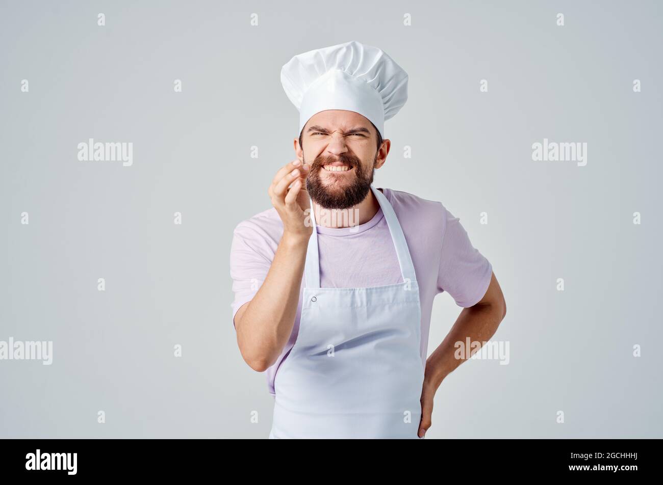 emotional male chef working in a restaurant kitchen service Stock Photo ...