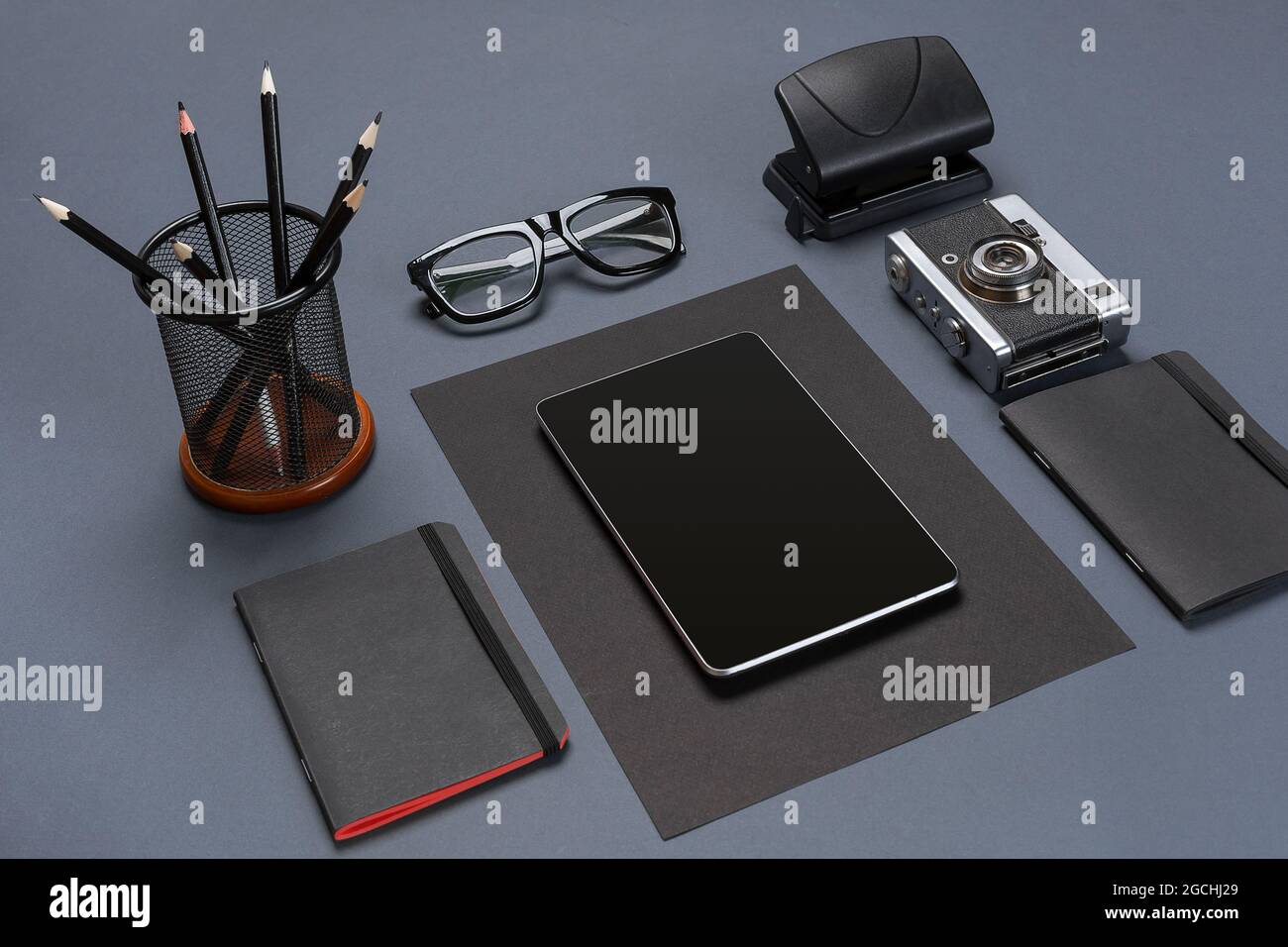 Black office stuff collection flat lay. Top view on set of stationery ...