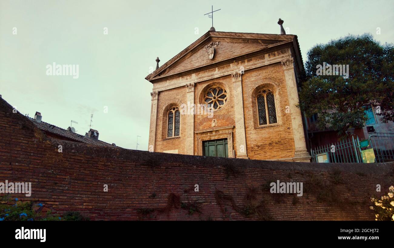 Low angle glimpse of medieval Basilica of Santa Aurea in Ostia Antica ...