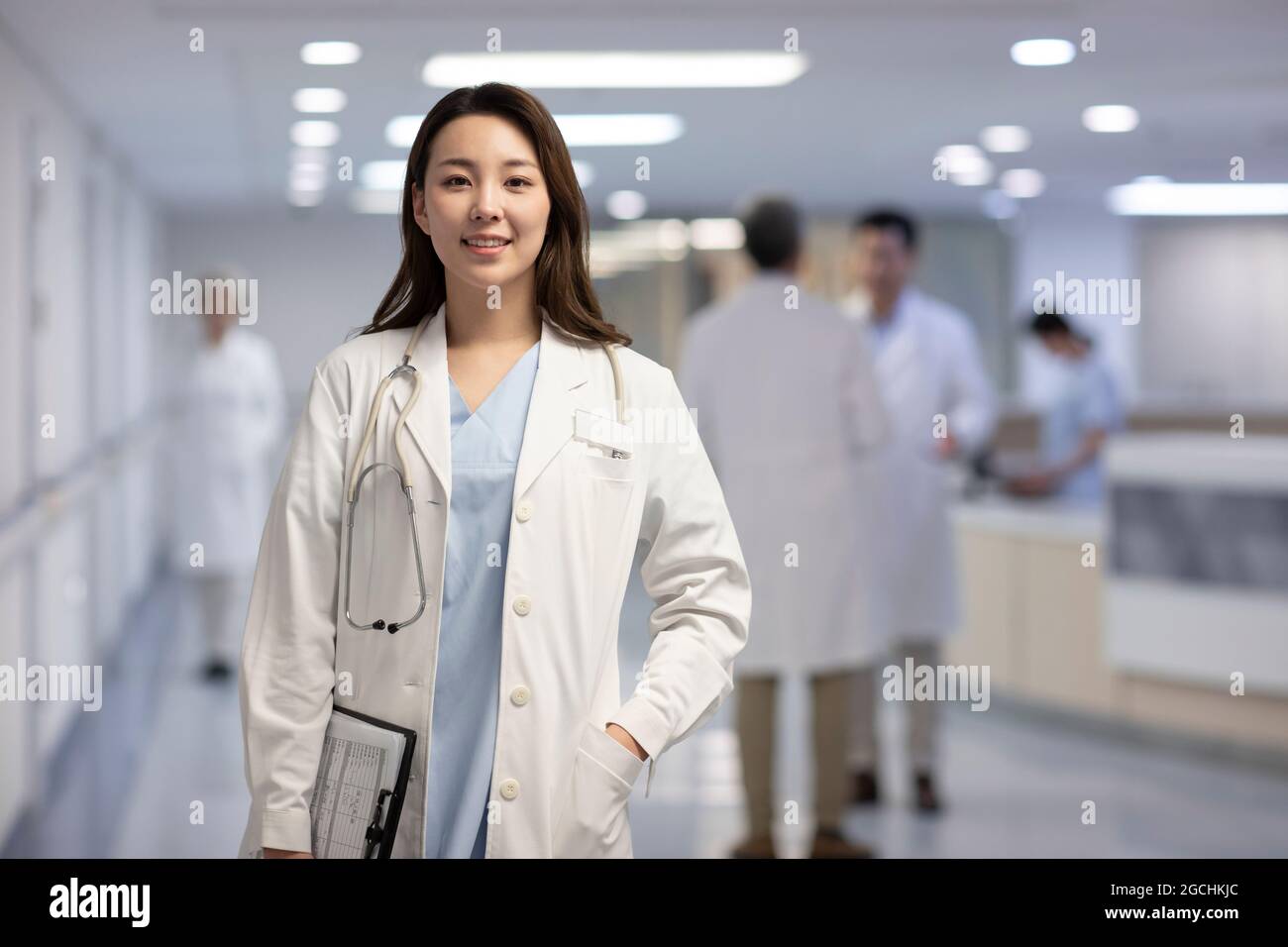 Young asian doctor talking camera hi-res stock photography and images ...