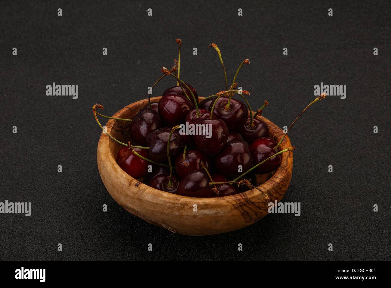 Sweet ripe bird cherry in the basket Stock Photo - Alamy
