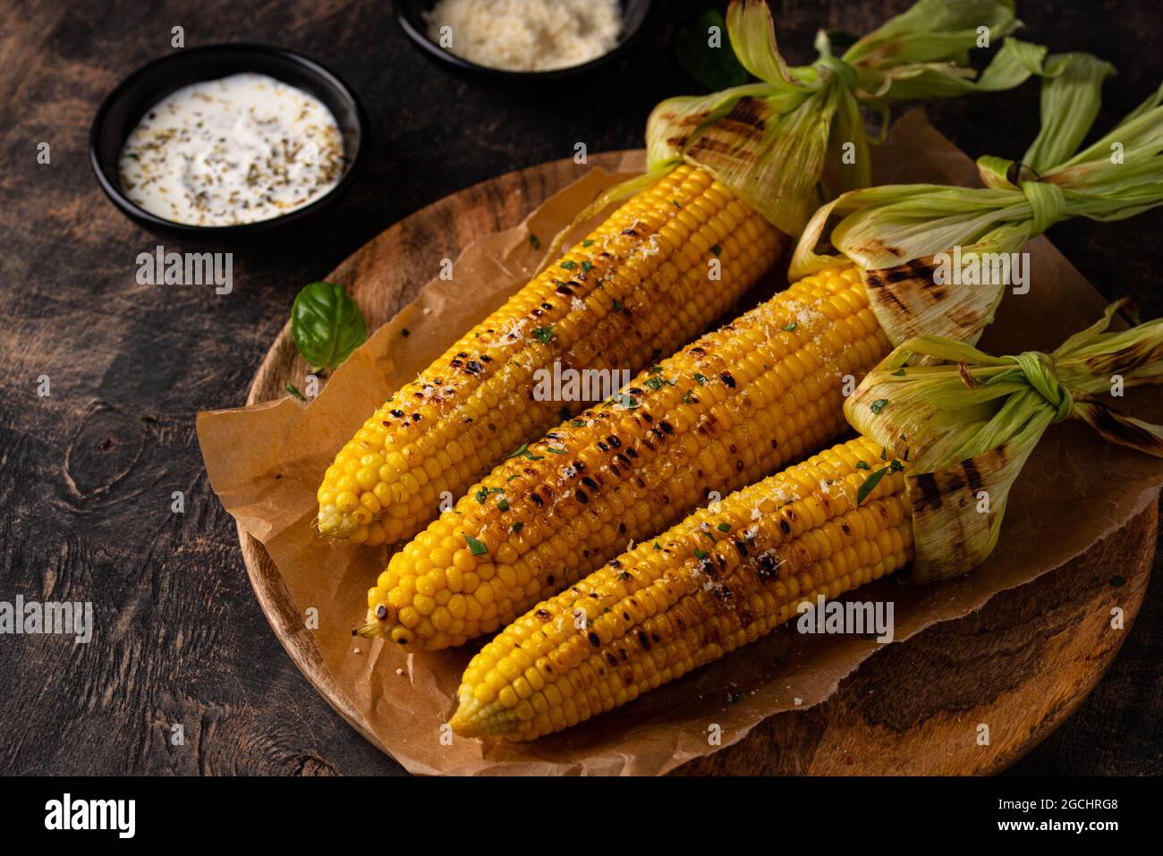 Grilled corn cobs with parmesan cheese Stock Photo - Alamy