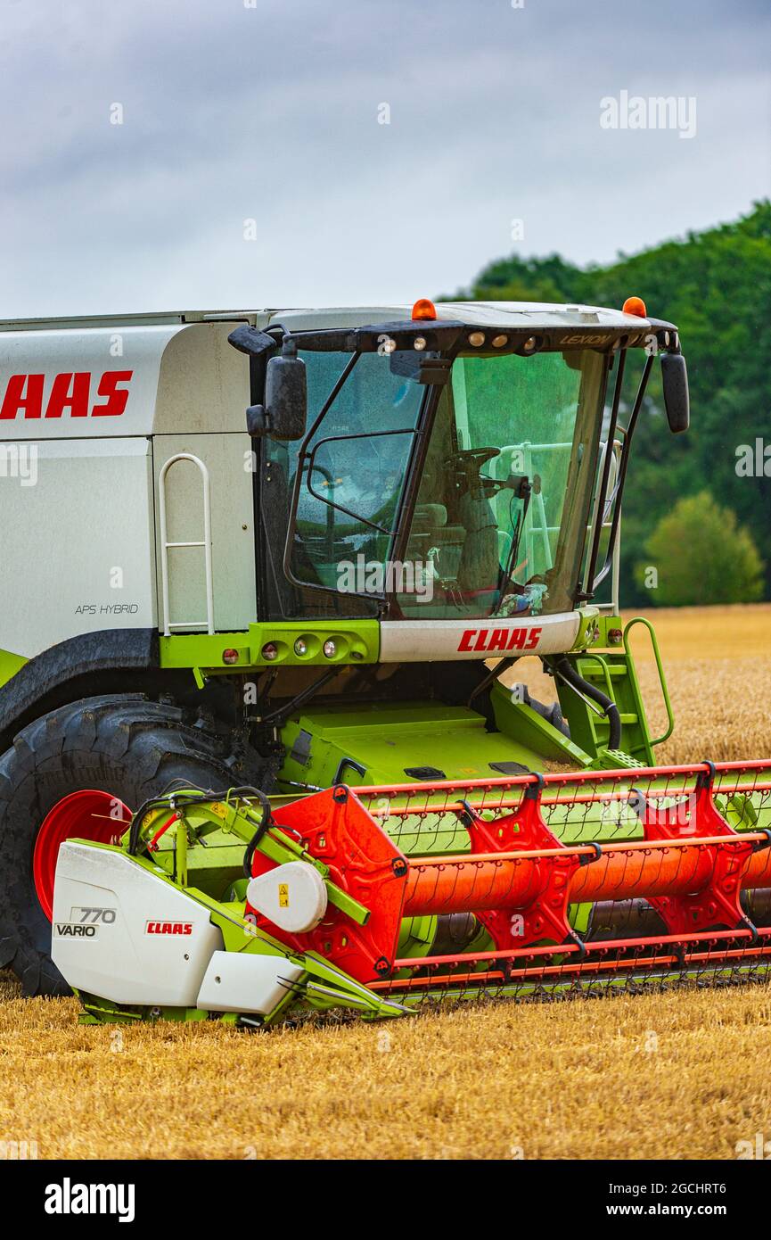 Class 750 Lexion combine harvesters parked up on a stubble field ...